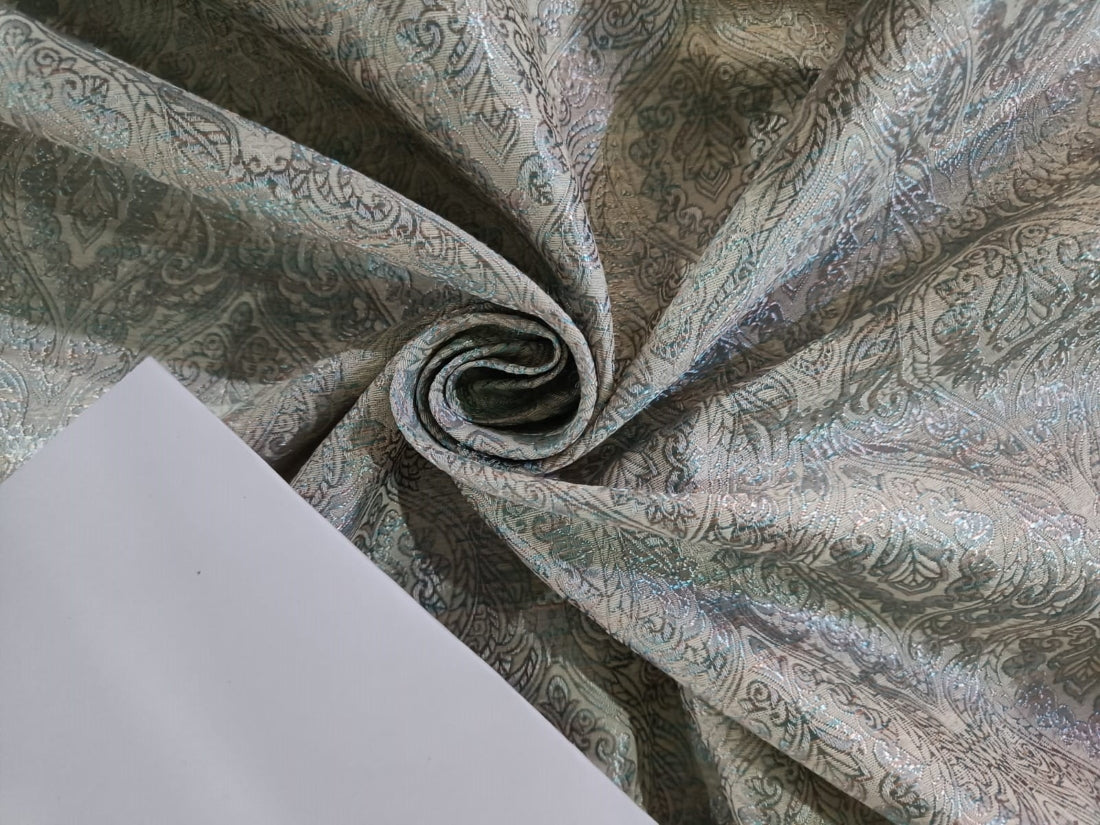 Silk Brocade jacquard fabric fawn with green and subtle metallic silve ...